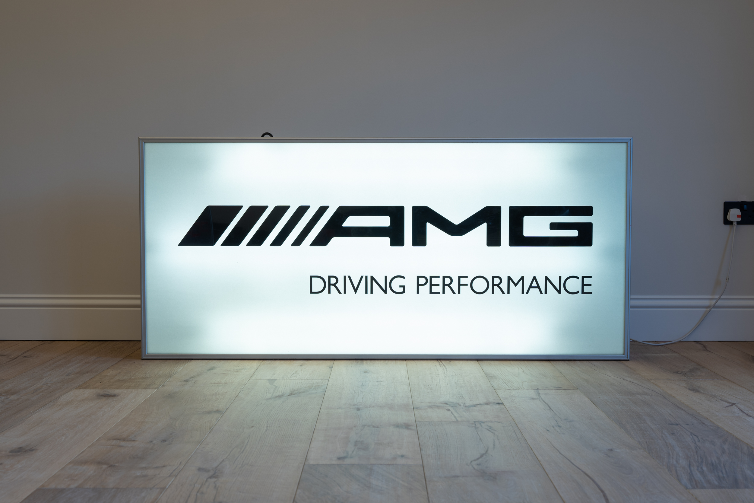 AMG 'DRIVING PERFORMANCE' ILLUMINATED SIGN for sale by auction in ...