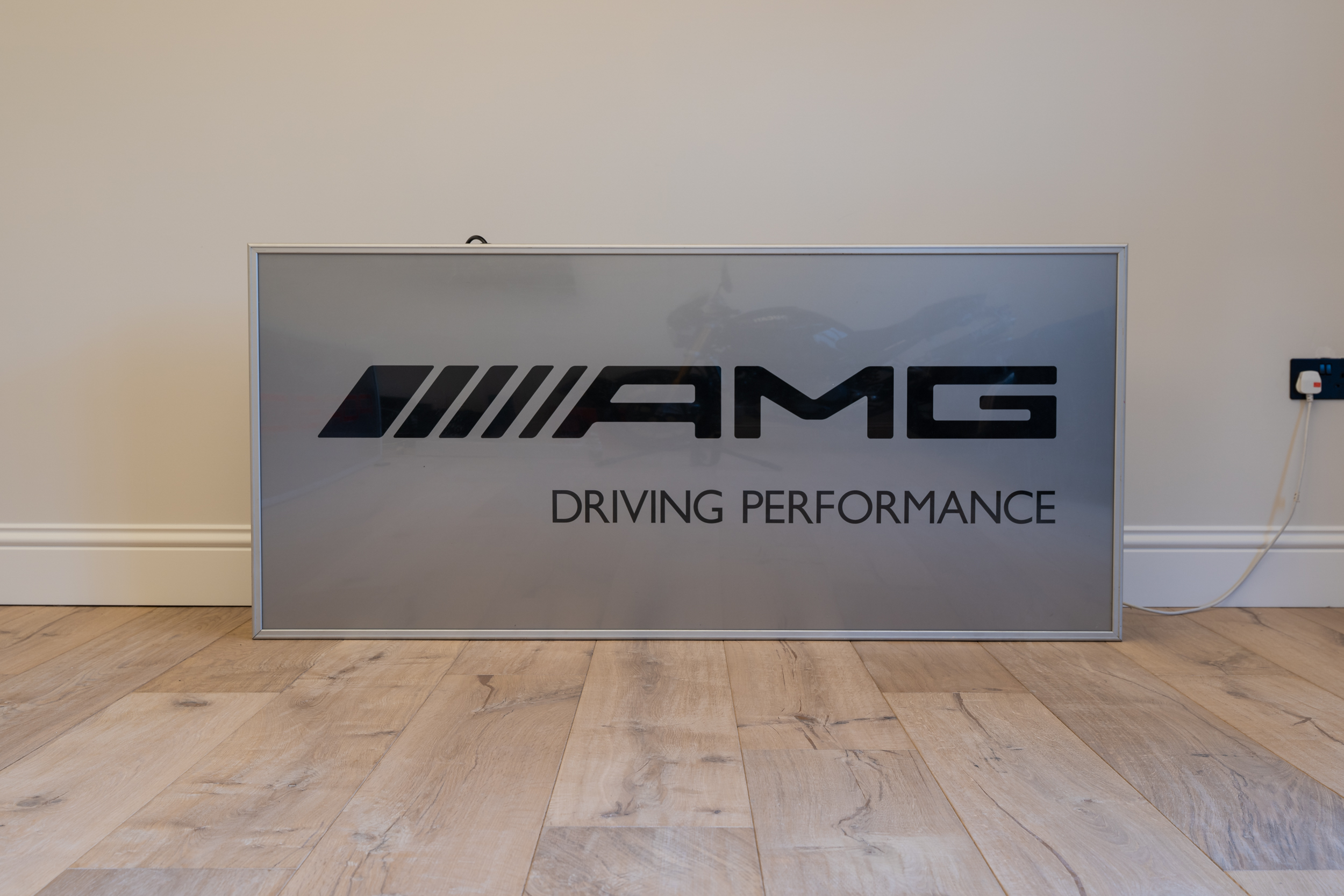 AMG 'DRIVING PERFORMANCE' ILLUMINATED SIGN for sale by auction in ...