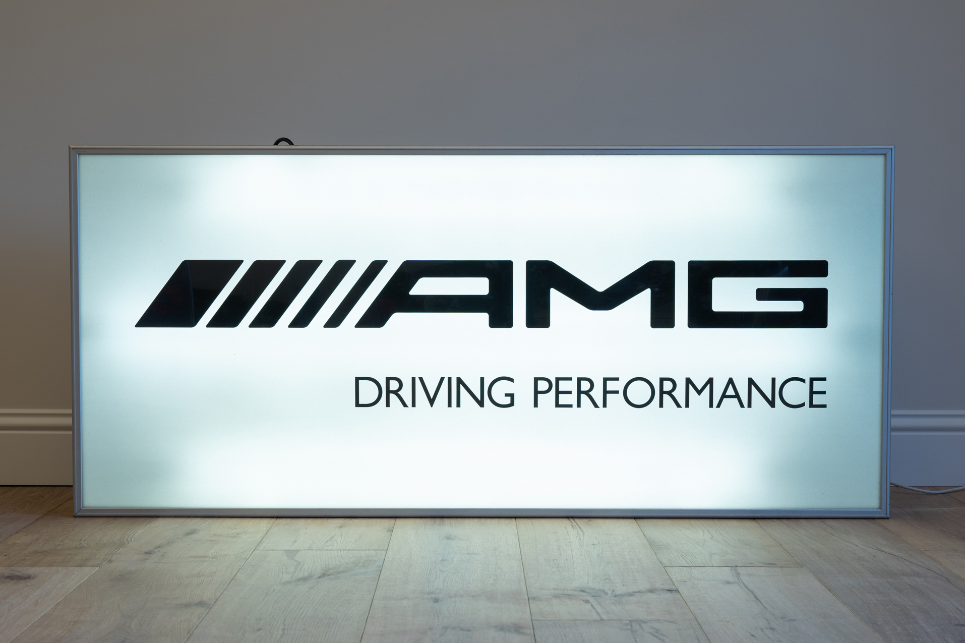 AMG 'DRIVING PERFORMANCE' ILLUMINATED SIGN for sale by auction in ...